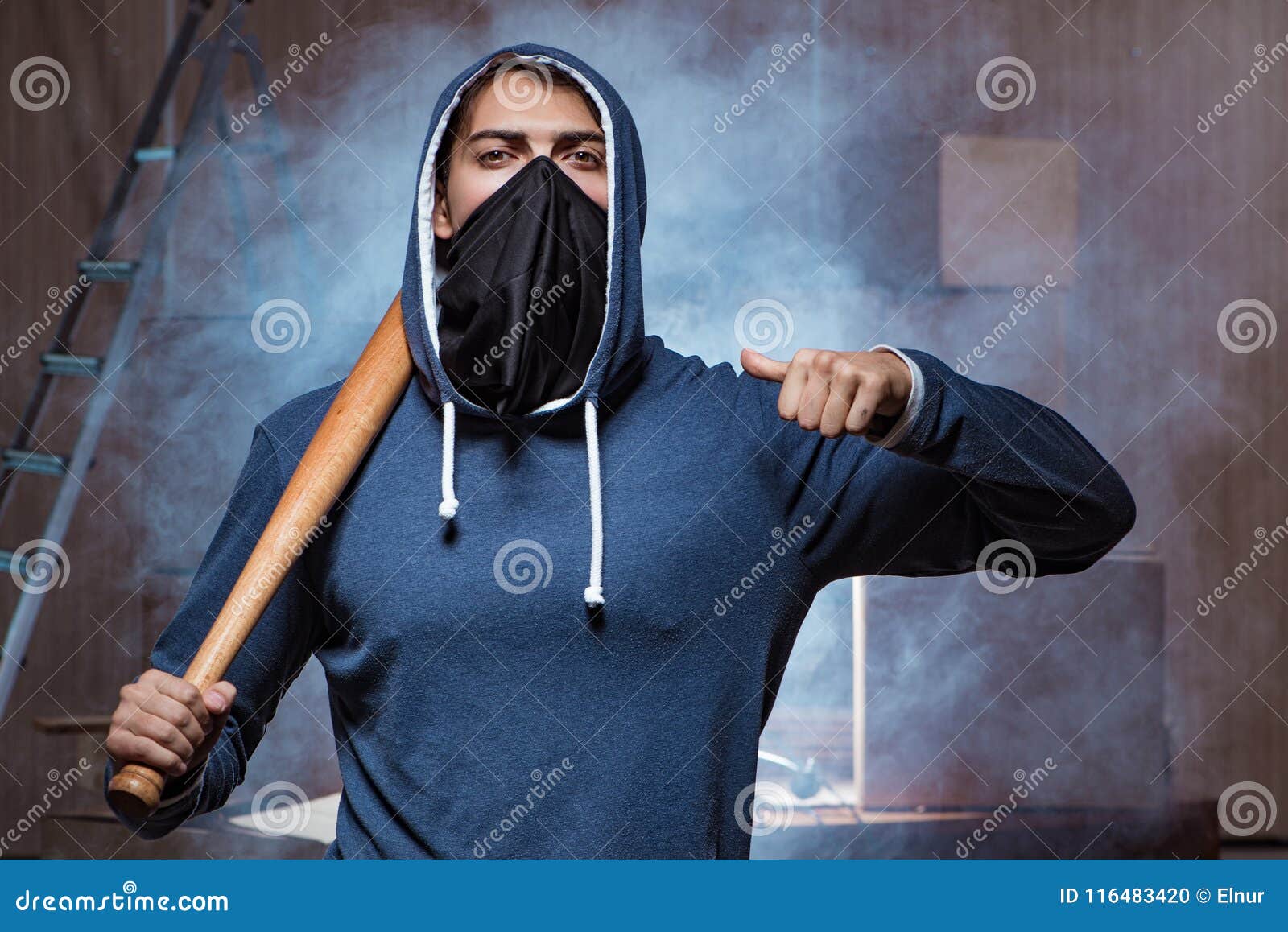 The Hooligan with Bat in Dark Room Stock Photo - Image of face, mask ...