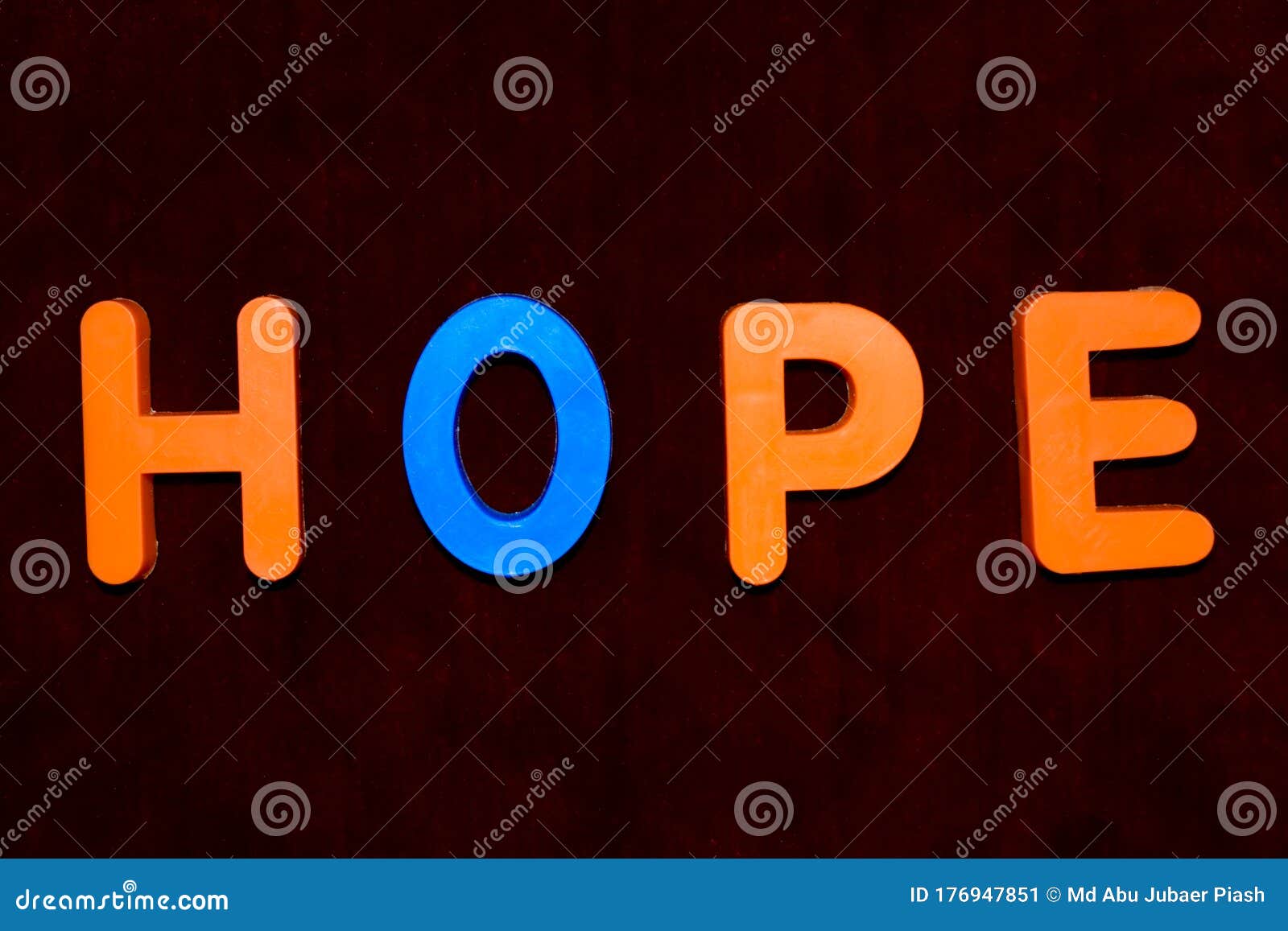 Hope Word Written With Different Colored Letter Blocks On A Dark ...