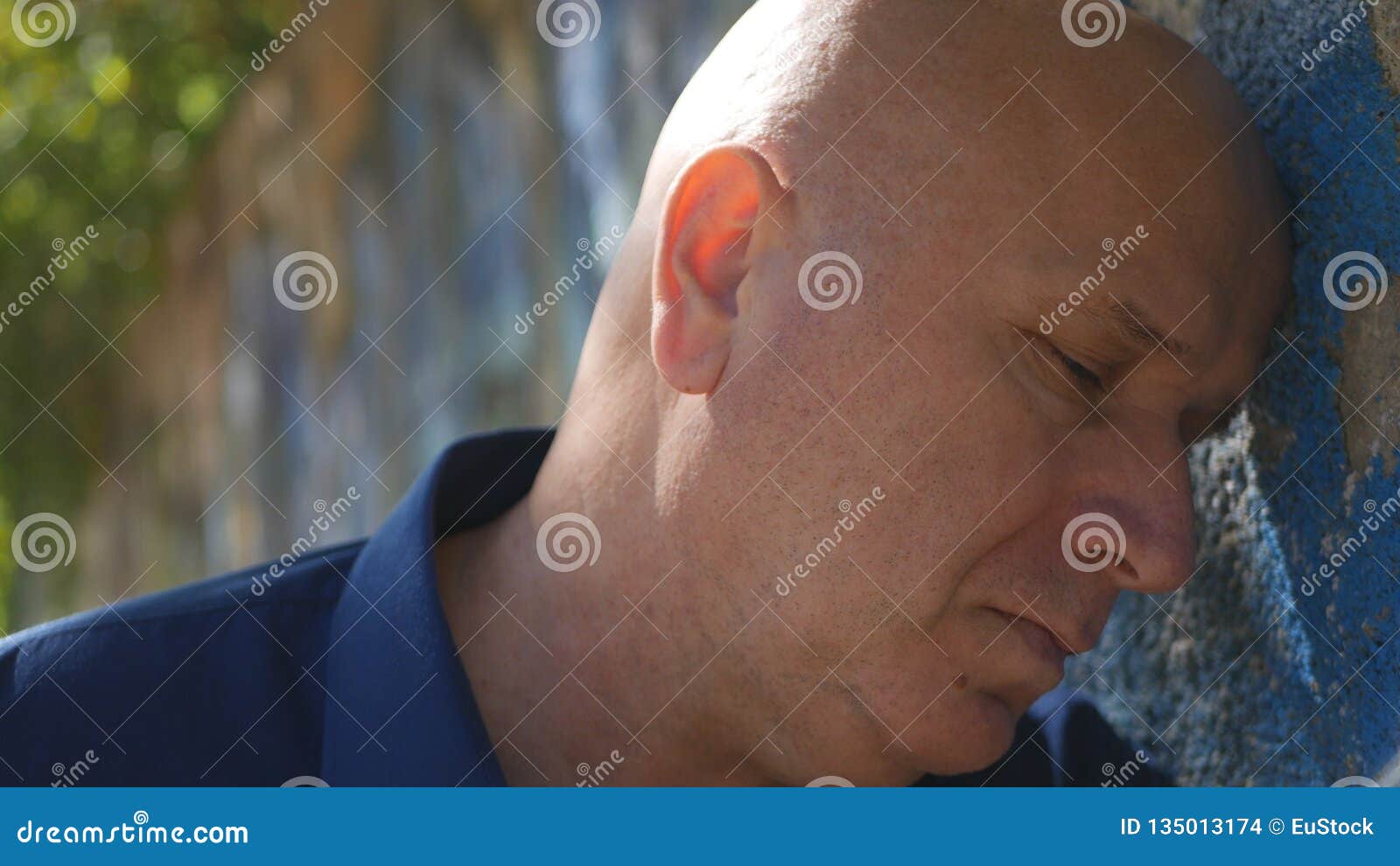 Hopeless and Upset Person Stay with Head on the Wall Resting Stock ...