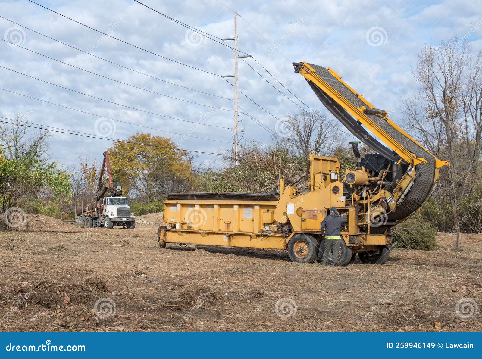 Horizontal Grinder with Log Truck during Deforestation Stock Image ...