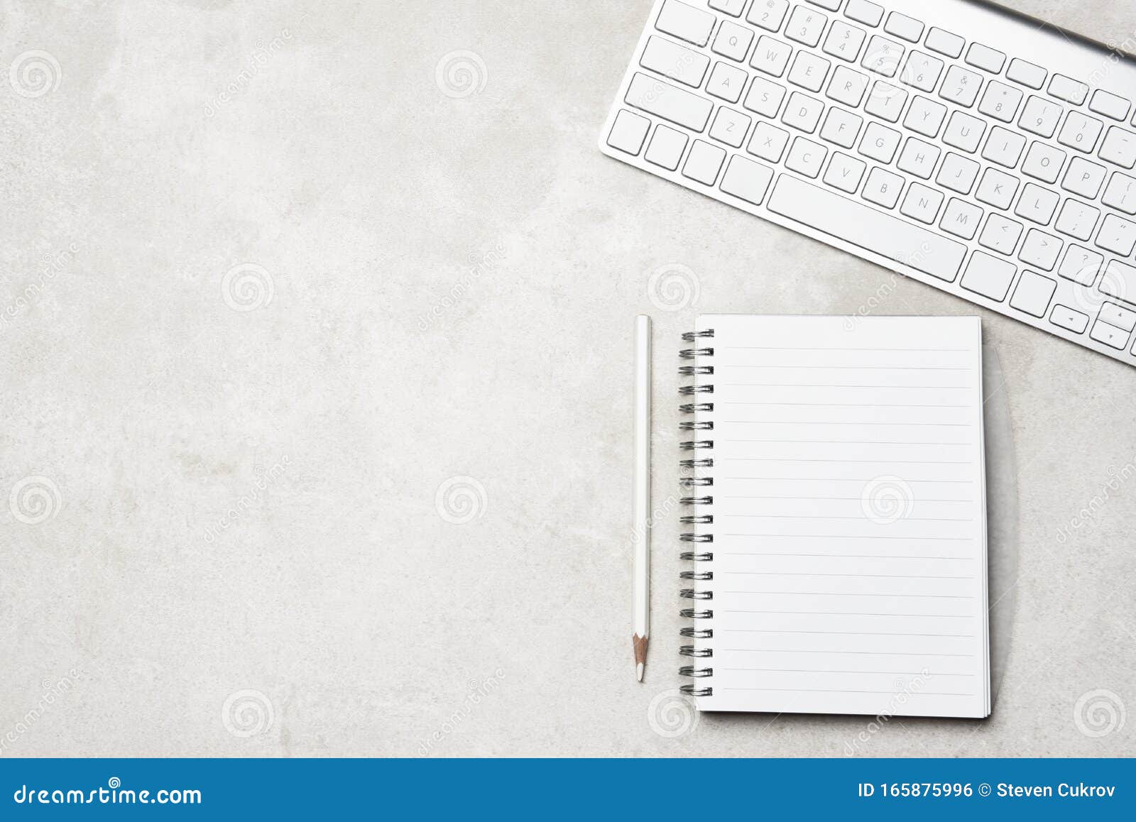 Horizontal High Key Workspace: a Note Pad with White Pencil and ...
