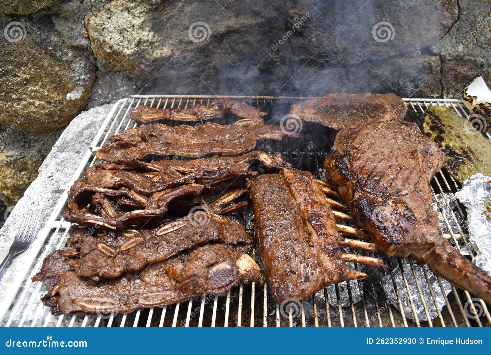 Horizontal Image of a Barbecue with Pork Ribs and Meat on the Grill ...