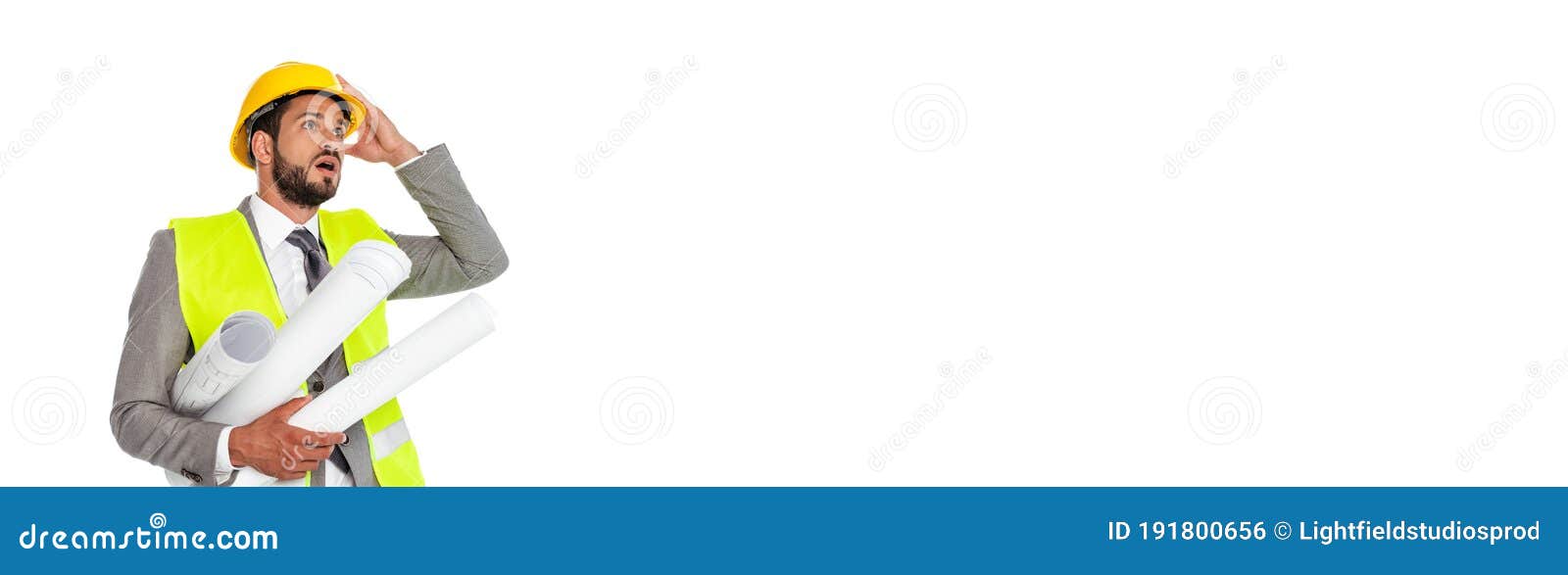 Horizontal Image of Shocked Engineer Looking Away while Holding ...