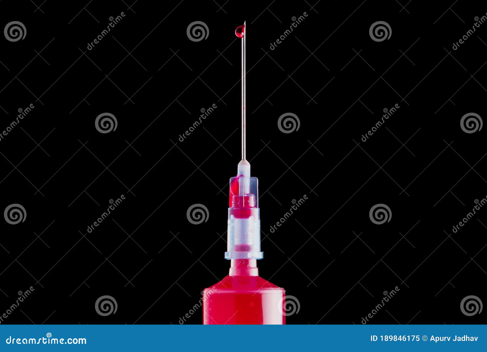 Horizontal Image of Syringe with a Drop of Blood at the Tip of it`s ...