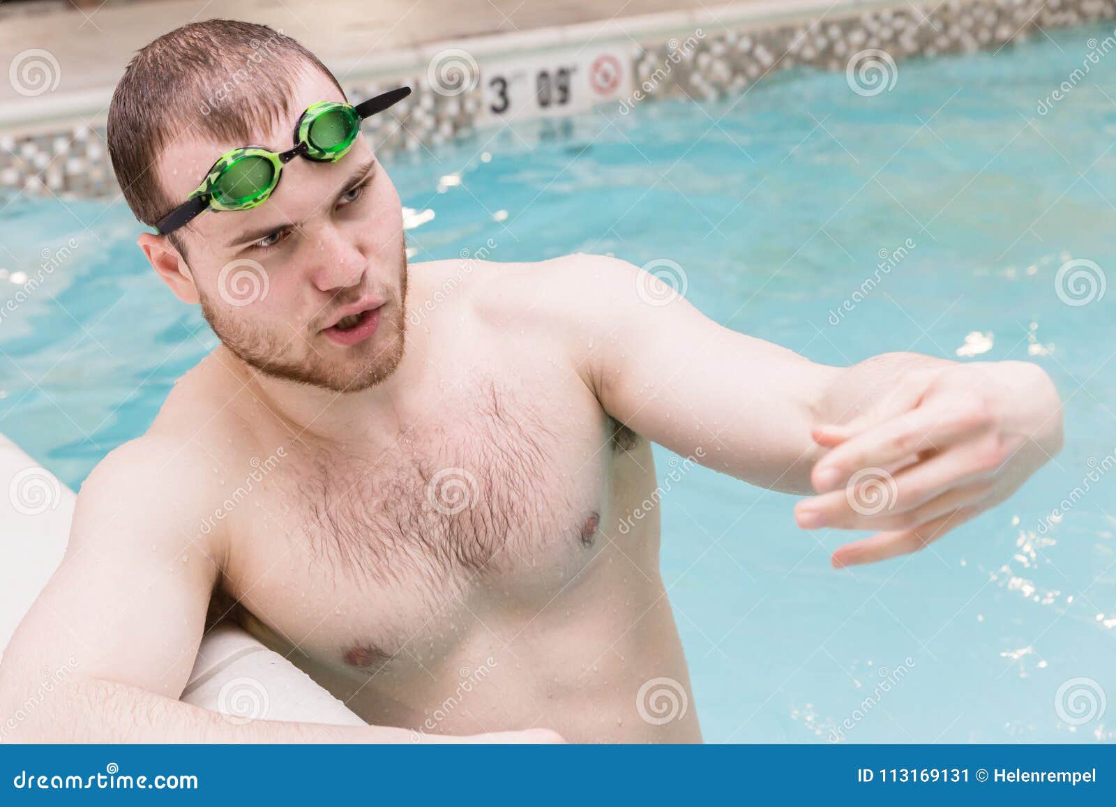 Close of Young Manstanding in Pool and Talking. Stock Image - Image of ...