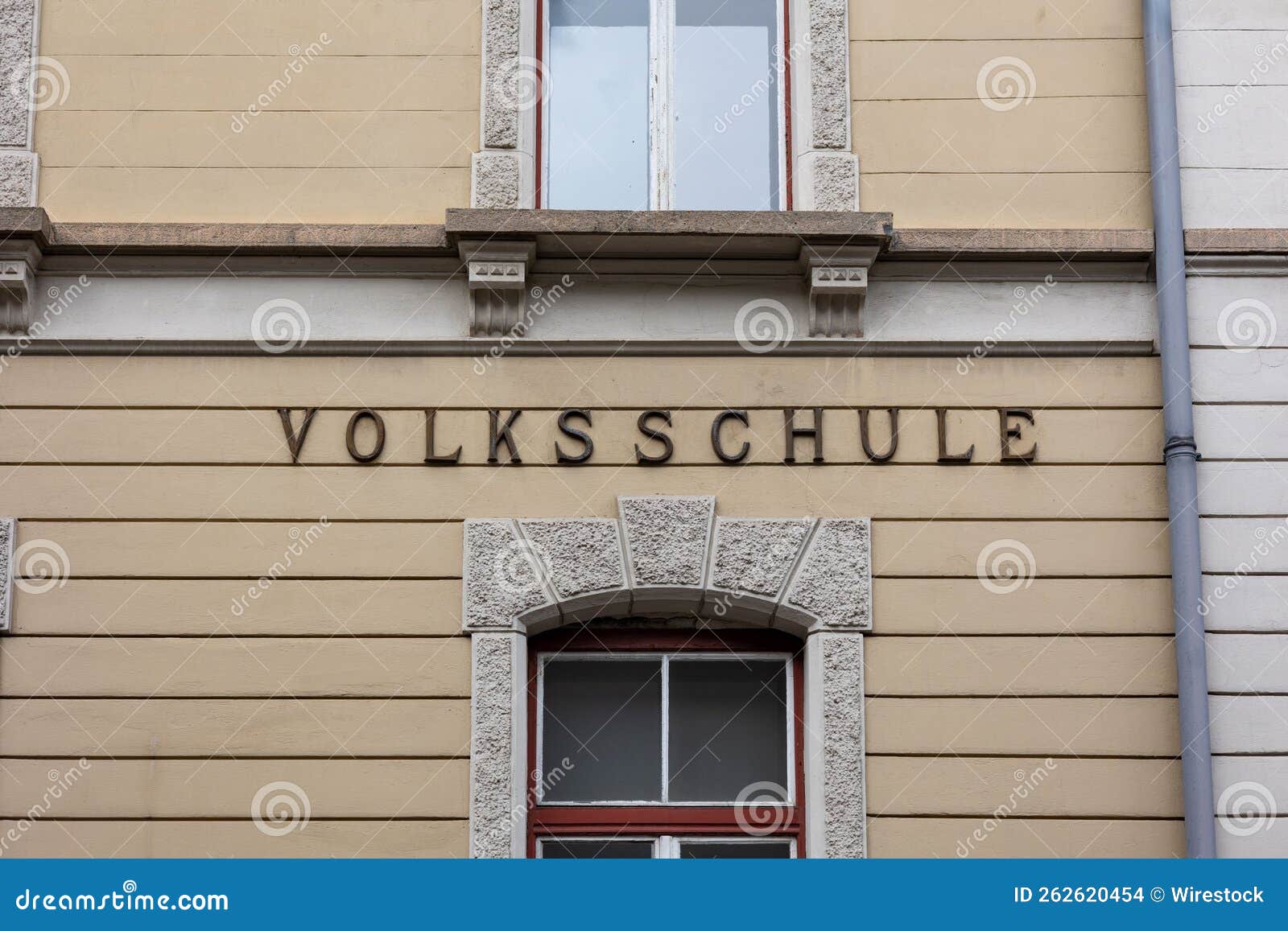 Horizontal Image of a Wall with a Text Volksschule, Elementary School ...