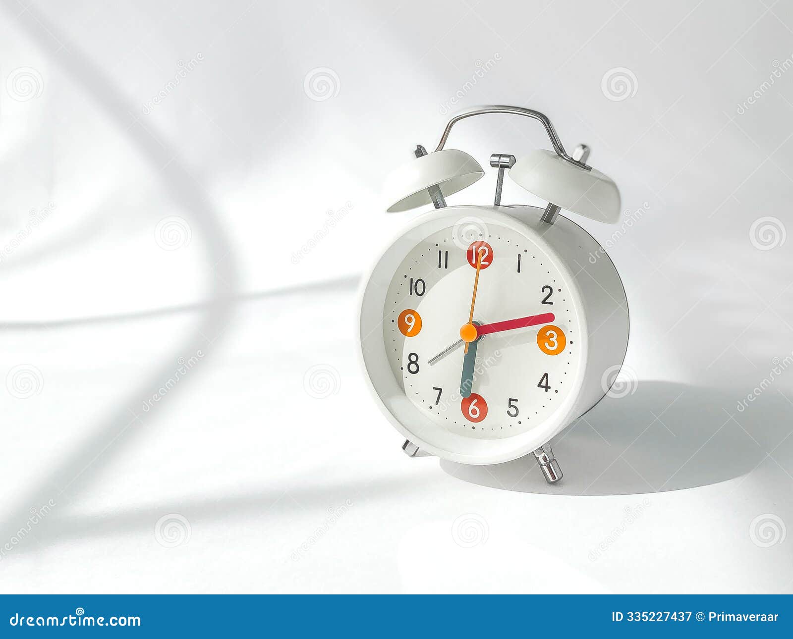 Bright White Round Alarm Clock with on White Background, Copyspace ...