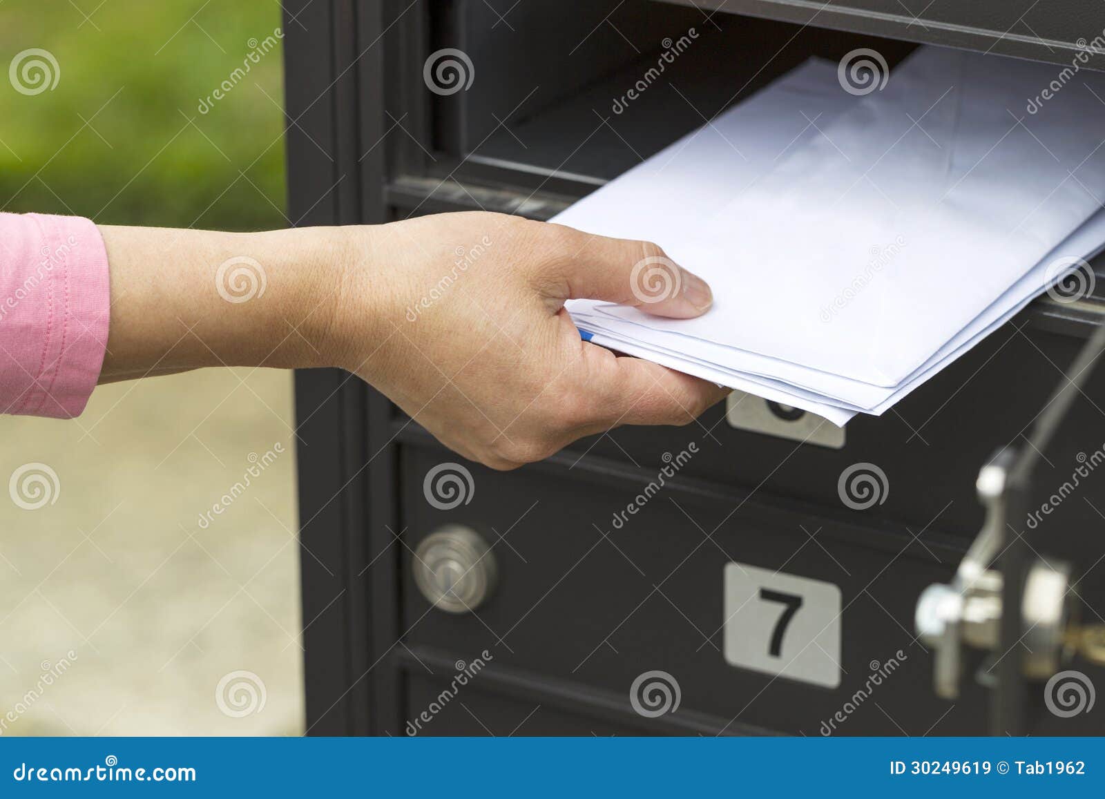 Putting up the mail stock image. Image of incoming, postbox - 30249619