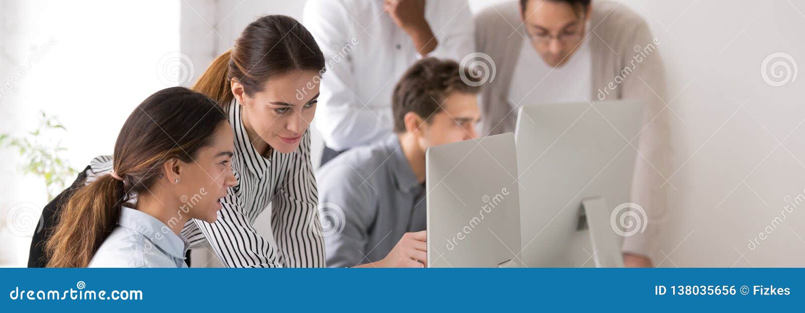 Horizontal Image in Coworking Room Mentor Helping Intern with Program ...