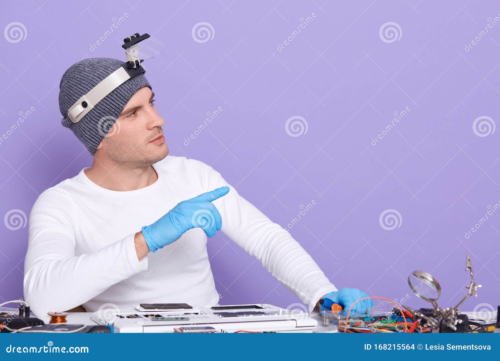 Horizontal Picture of Young Professional Electronic Engineer Fixing ...