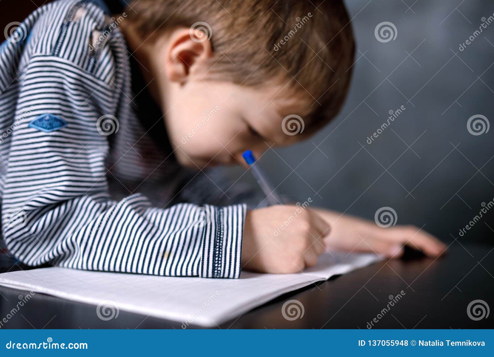 Boy Writing Letter Smiling Classroom Photos - Free & Royalty-Free Stock ...