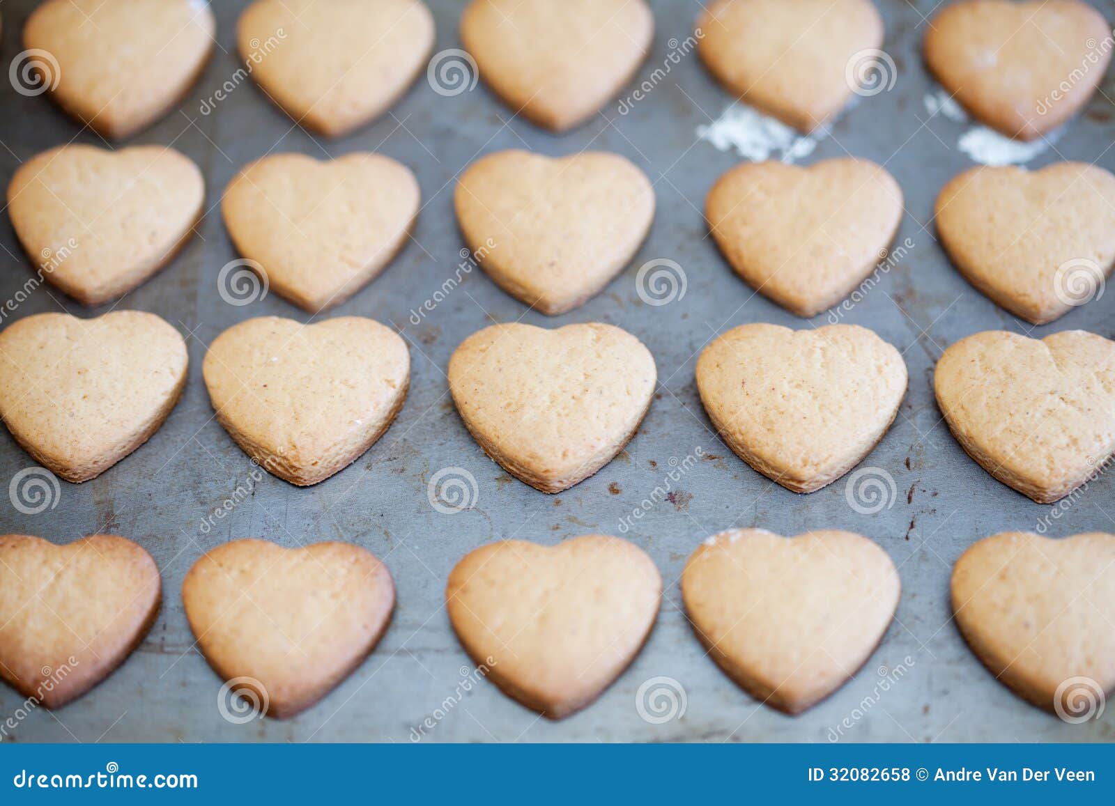 Horizontal Rows of Heart Shapes Cookies on Baking Tray Stock Photo ...