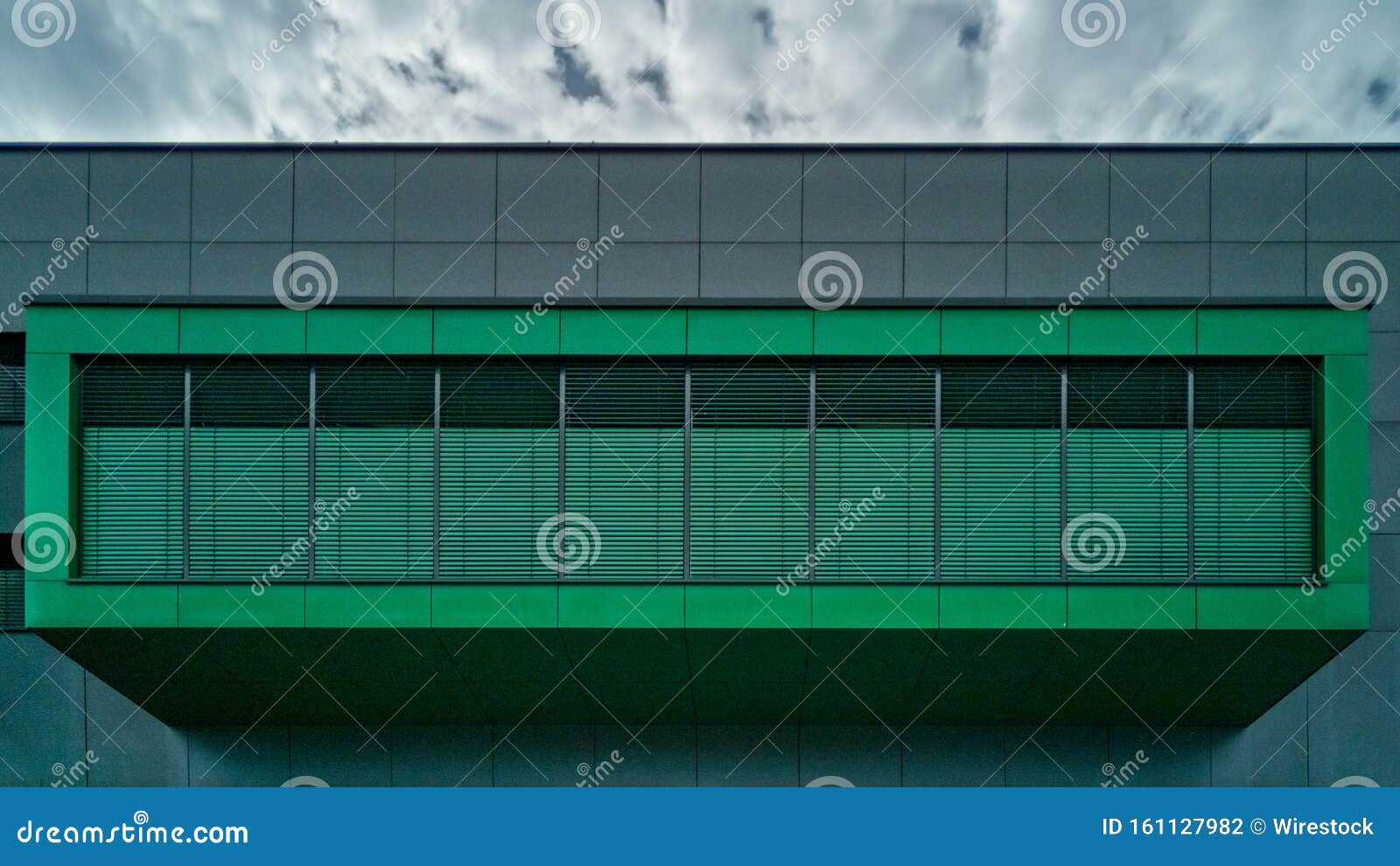 Horizontal Shot of a Beautiful Grey and Green Building Under the ...