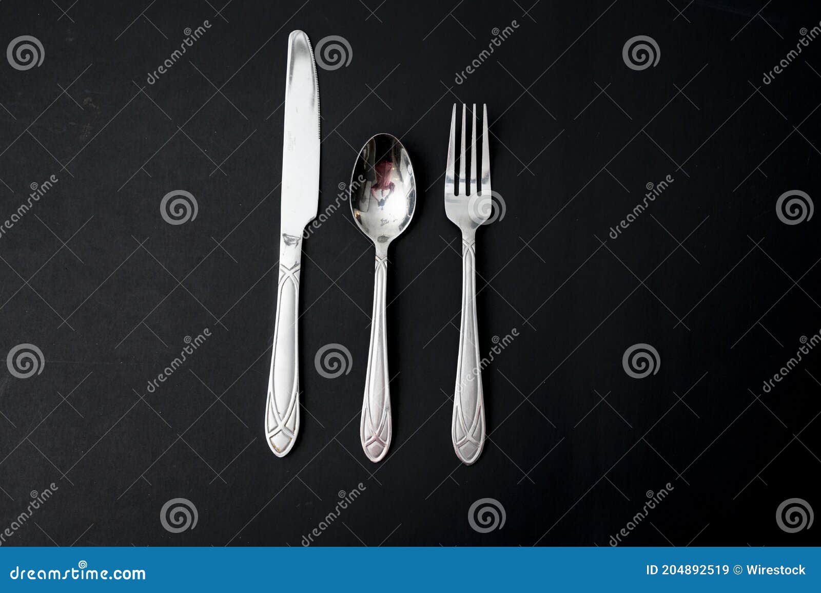 Horizontal Shot of Knife, Spoon, and Fork Stock Image - Image of metal ...