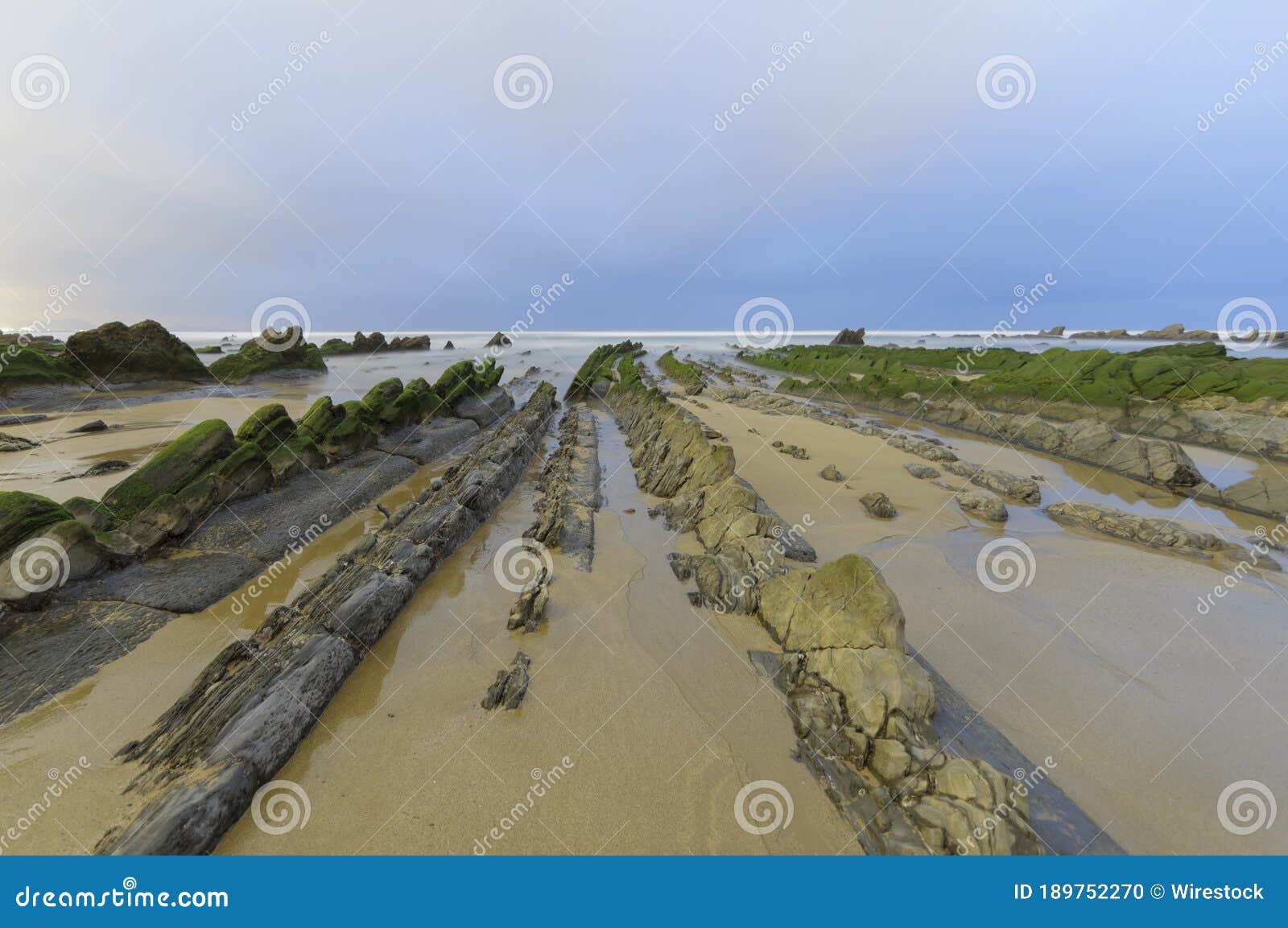 Horizontal Shot of Muddy Flysch Under a Clear Sky on a Beach of Bilbao ...