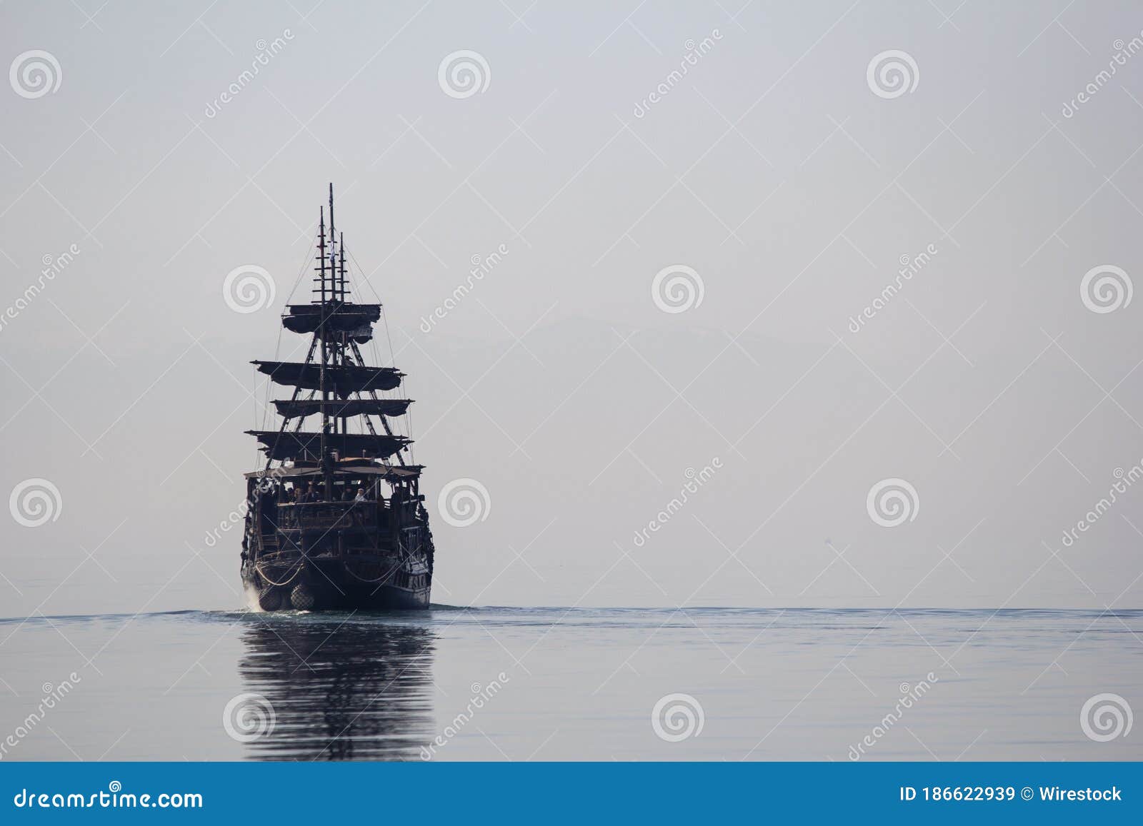 Horizontal Shot of a Tall Ship Sailing on Beautiful Clear Water during ...