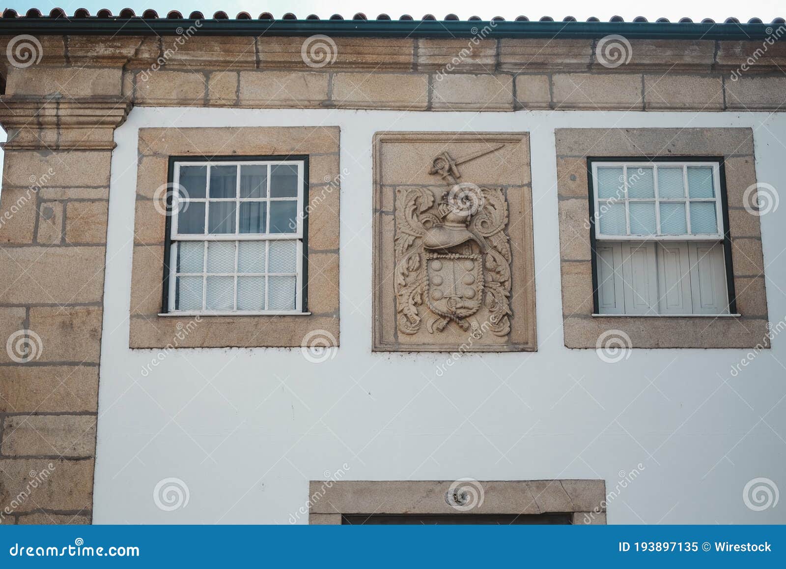 Horizontal Shot of Wooden Windows and Carving Patterns on a Building ...