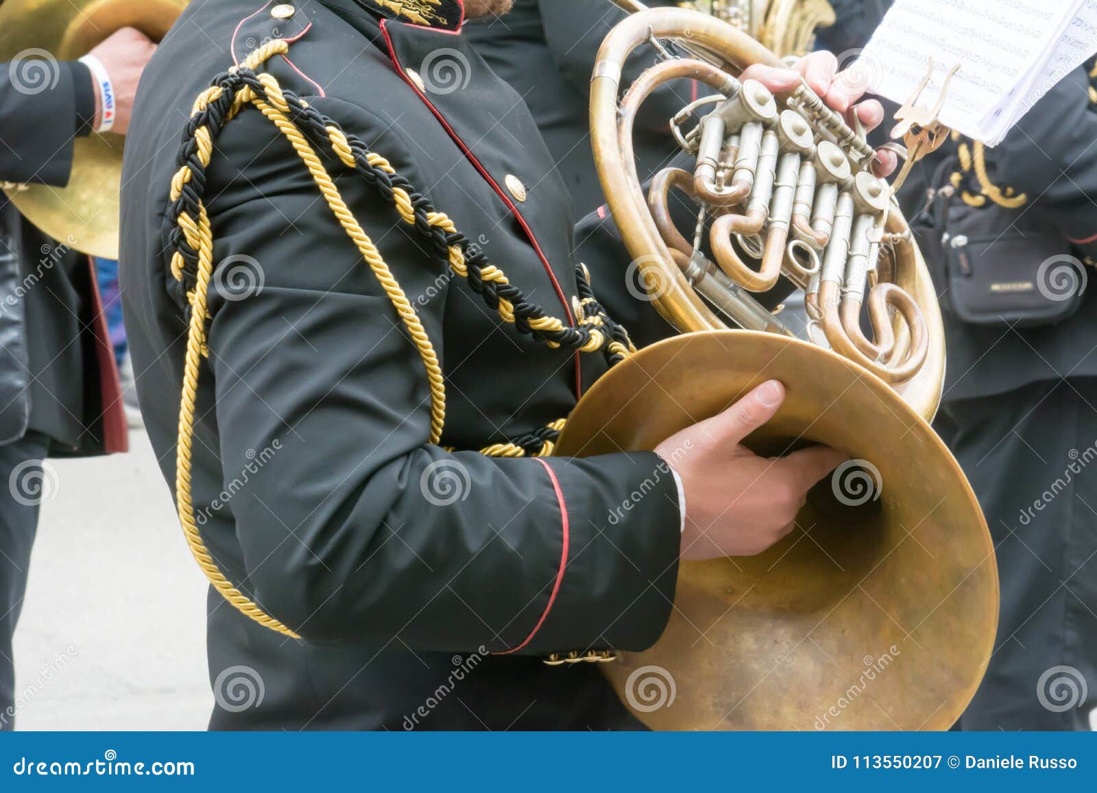 Horizontal View of Close Up of Musician Playing Horn in Black Un Stock ...