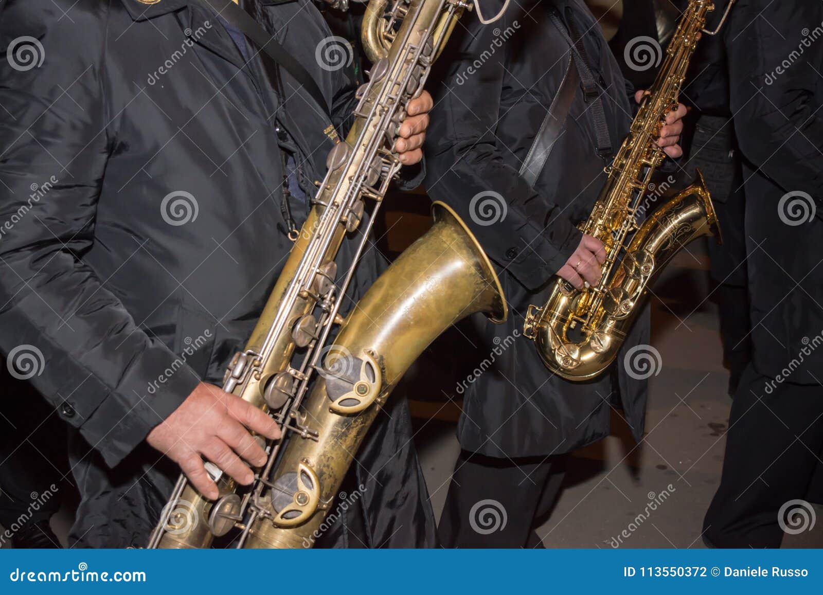 Horizontal View of Close Up of Musicians Playing Saxophone in Bl Stock ...