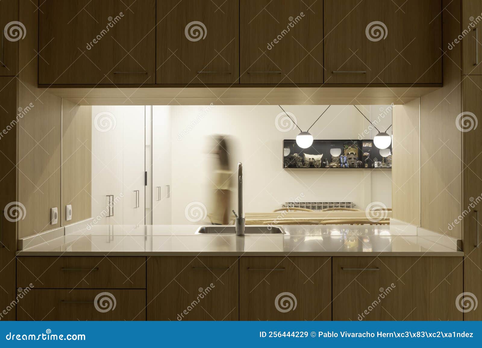 Horizontal View of Double Modern Wood Kitchen with Person in Movement ...
