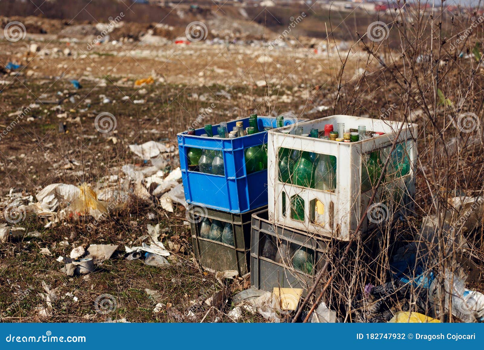 Horizontal View. Garbage Thrown in the Field. Crates Filled with Empty ...