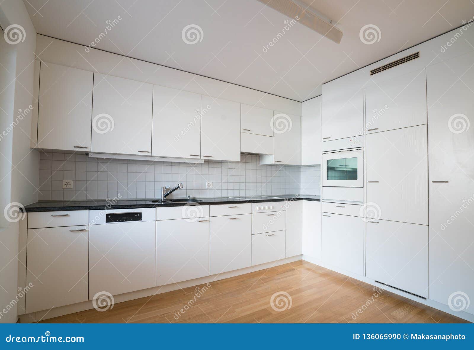 Modern Bright Kitchen in an Empty Refurbished Apartment with Black ...