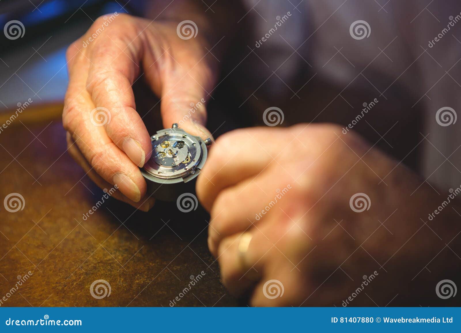 Horologist Examining a Clock Part Stock Photo - Image of holding ...