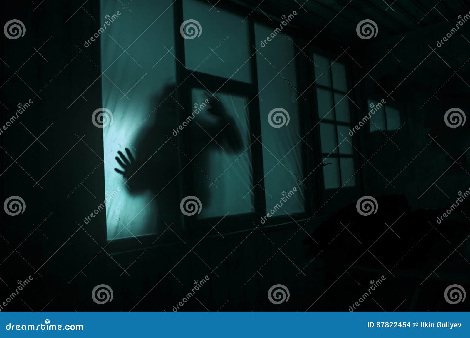 A Horror Concept Of A Scary Hooded Man Standing In A Field Of Corn ...