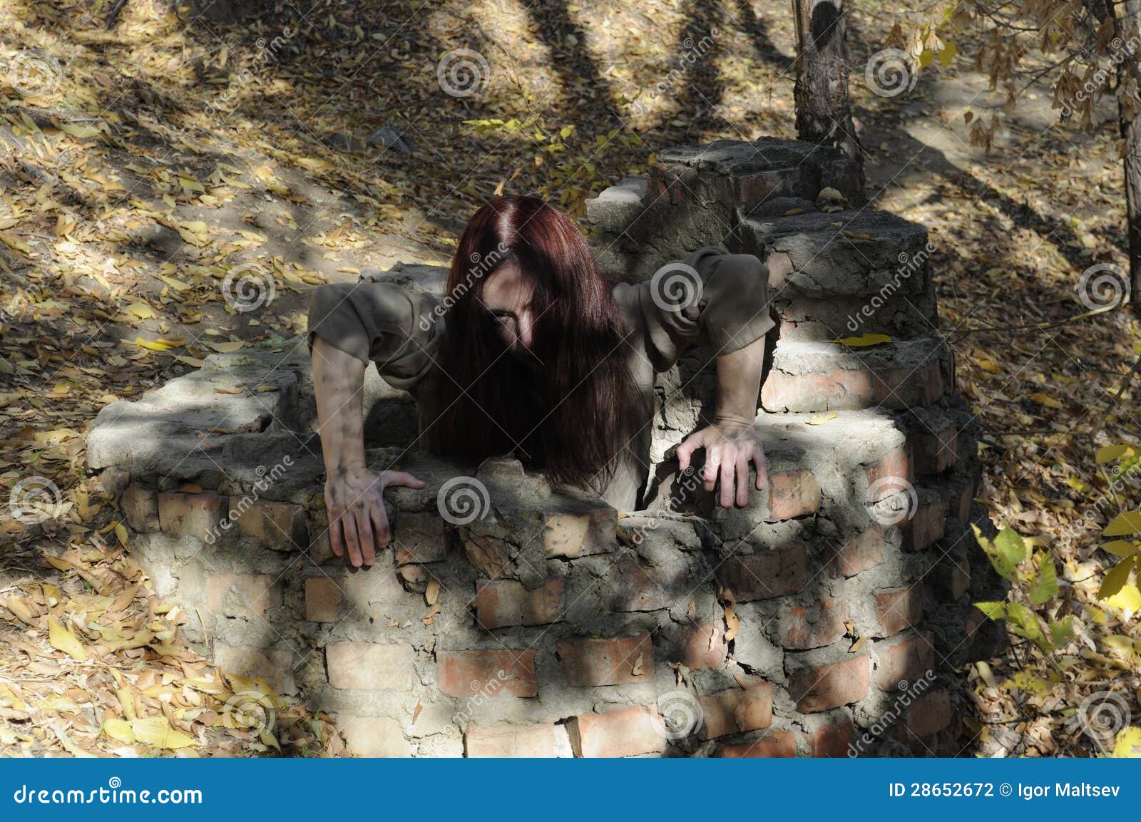 Horror woman well stock photo. Image of brickwork, single - 28652672