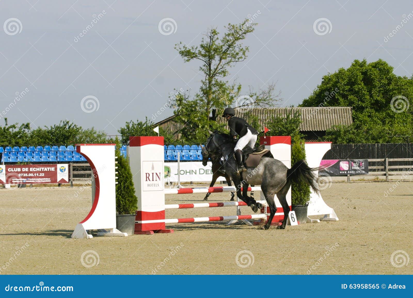 Equitation Contest, Horse Jumping Over Obstacle Editorial Image - Image ...