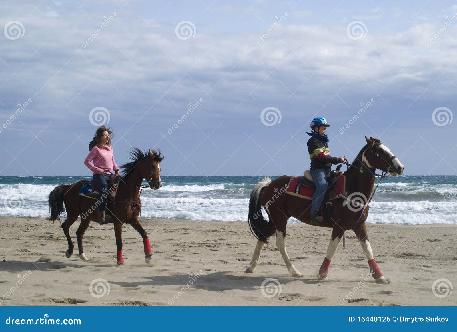 Horse riding on the beach editorial photo. Image of events - 16440126