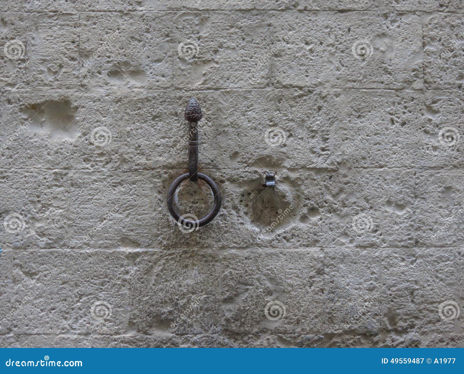 Horse-ring on a stone wall stock image. Image of century - 49559487