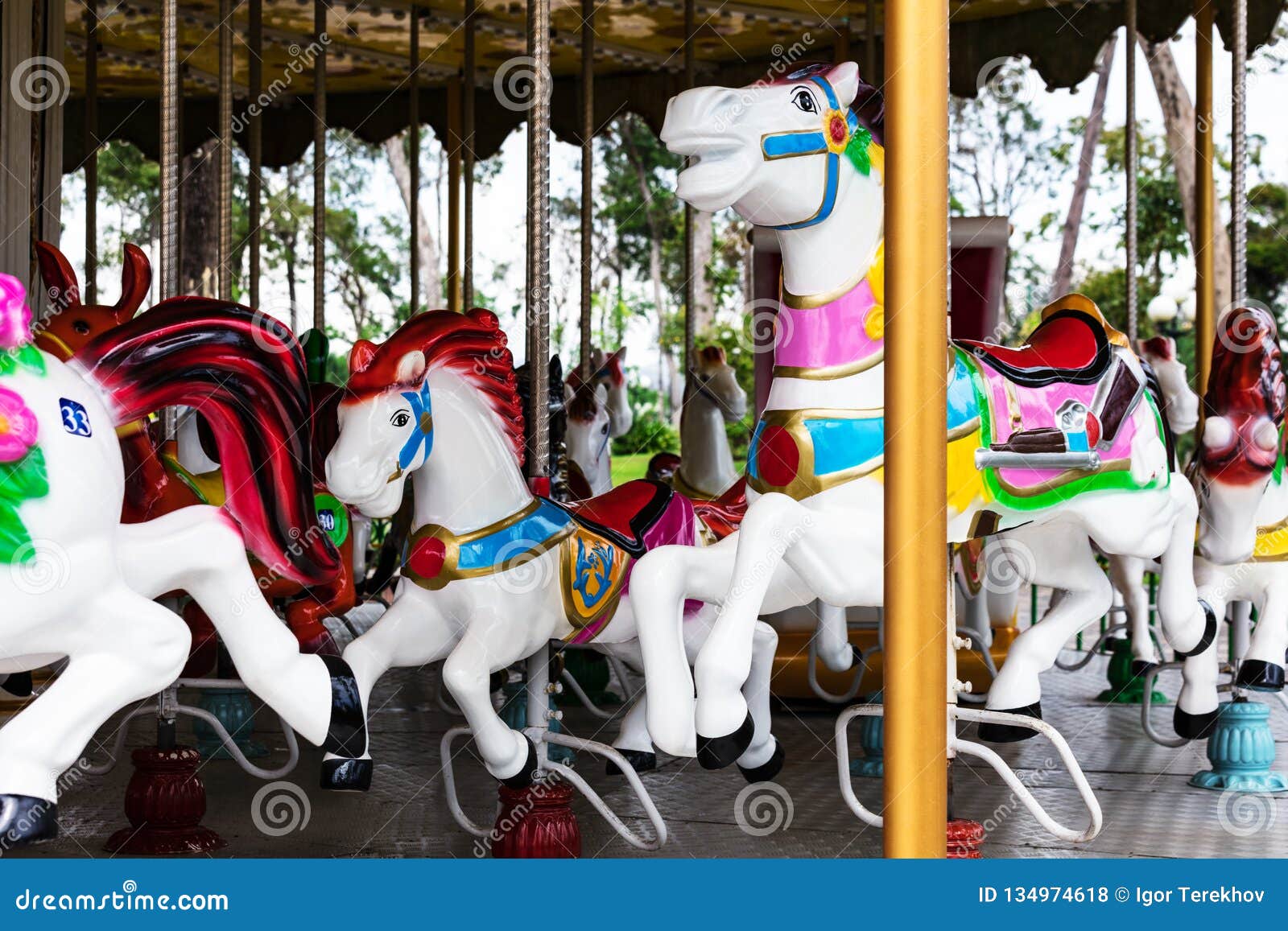 Horses on a Carnival Merry Go Round Stock Photo - Image of delight ...