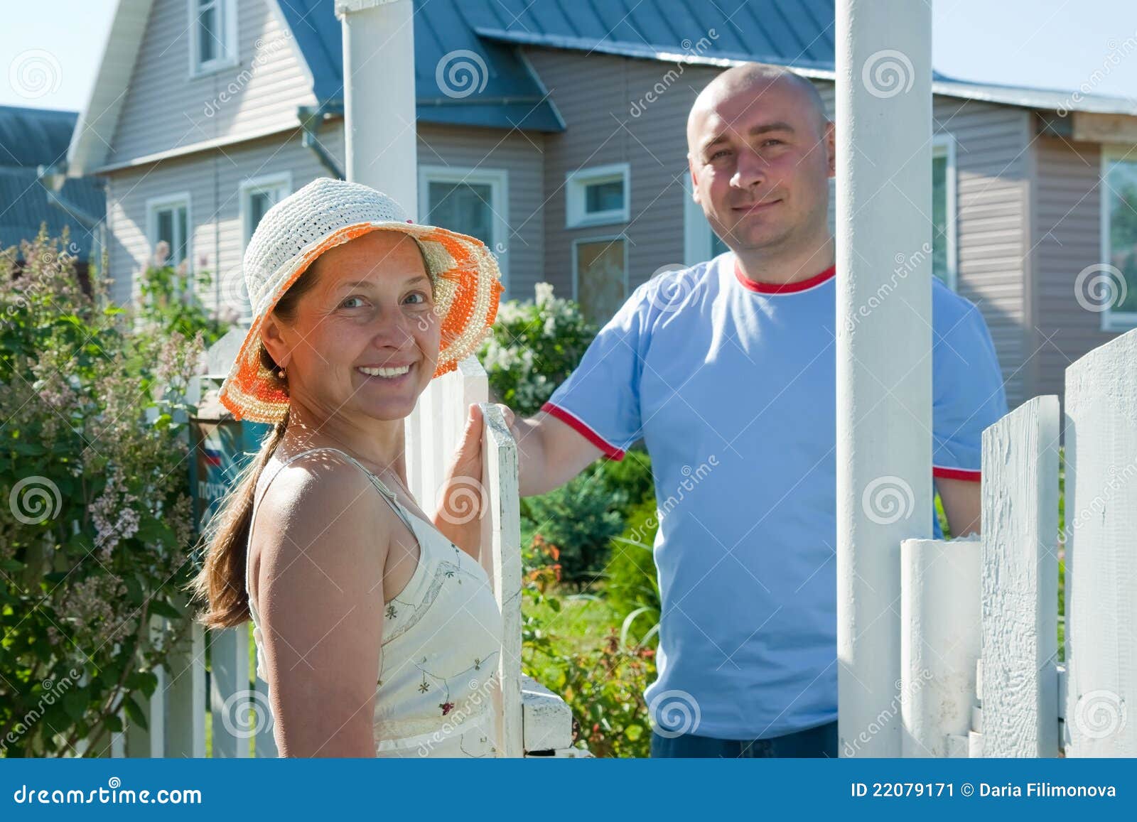 Hospitable man and woman stock image. Image of home, attractive - 22079171