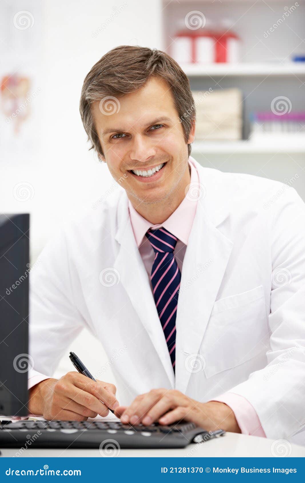 Hospital doctor at desk stock photo. Image of male, indoors - 21281370