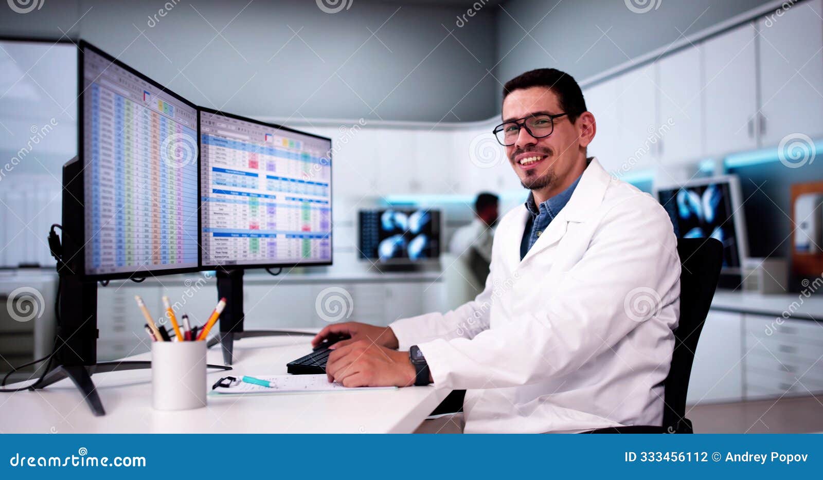 Hospital Doctor Using Spreadsheet for Billing Codes Stock Photo - Image ...