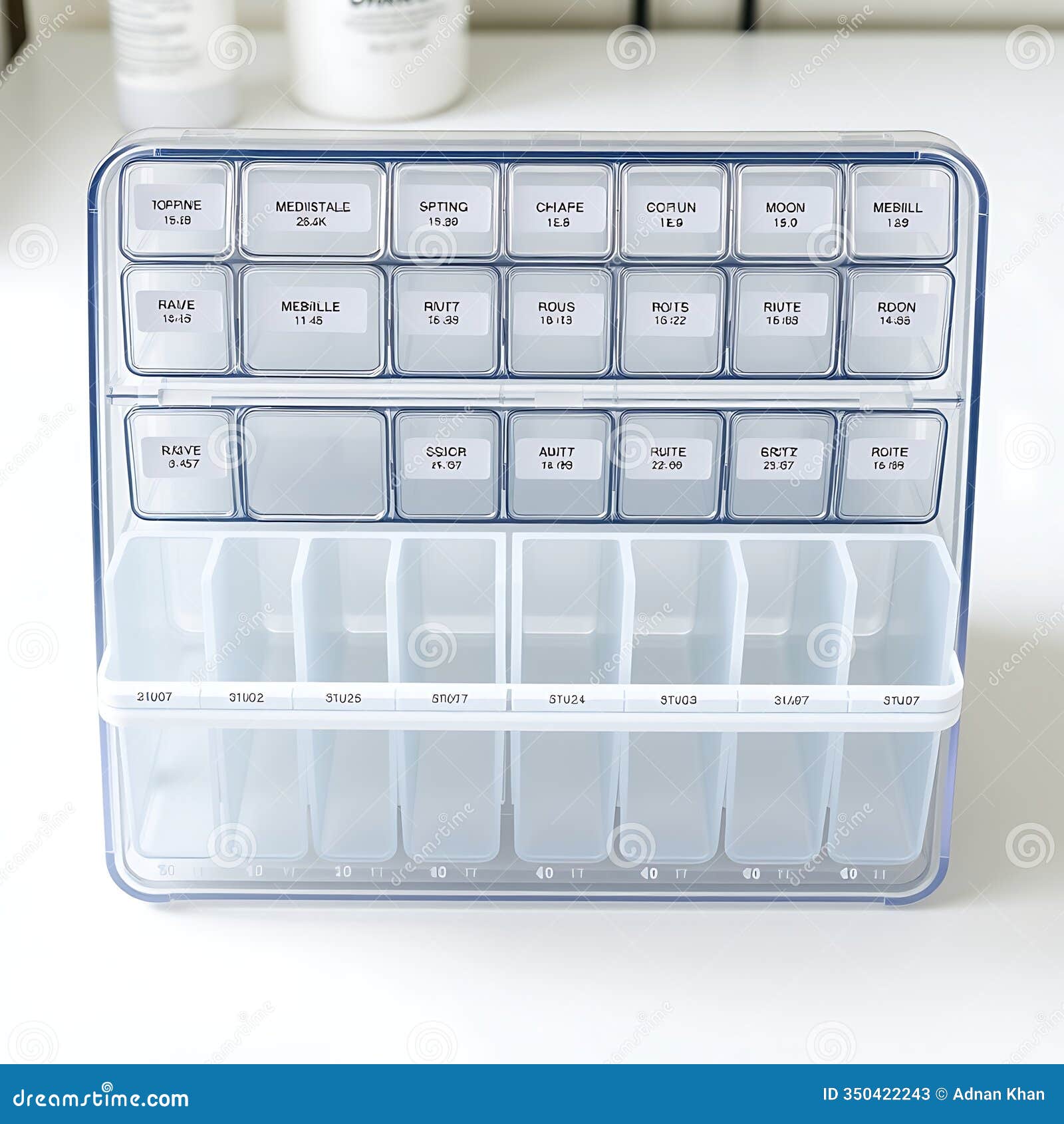 A Hospital Grade Medication Organizer with Labeled Compartments Placed ...