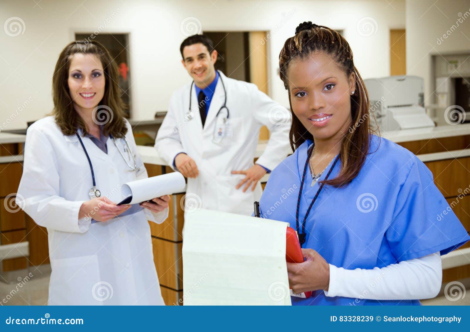 Hospital: Multi-Ethnic Medical Team at Work Stock Image - Image of ...