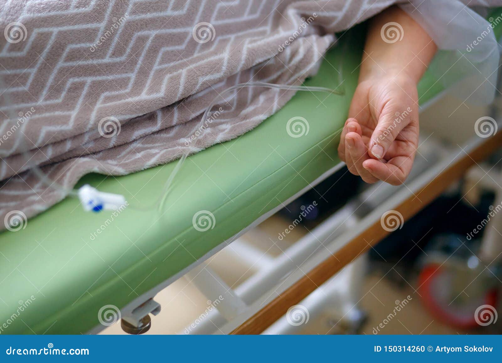 Hospital Patient Hand with Saline Solution in Intravenous Drip Dropper ...