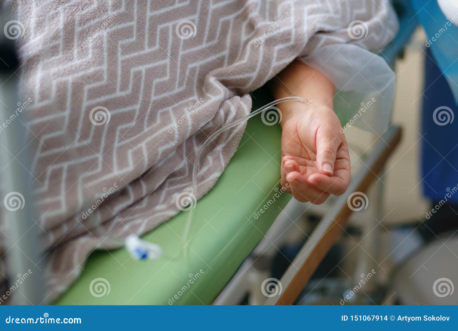 Hospital Patient Hand with Saline Solution in Intravenous Drip Dropper ...