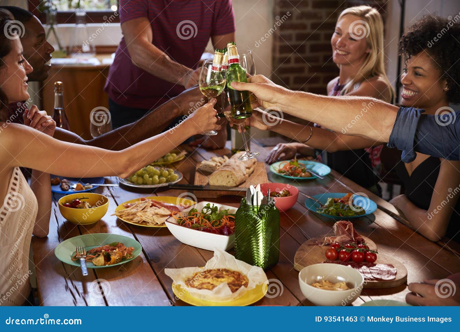 Host and Friends Making a Toast at a Dinner Party, Close Up Stock Image ...