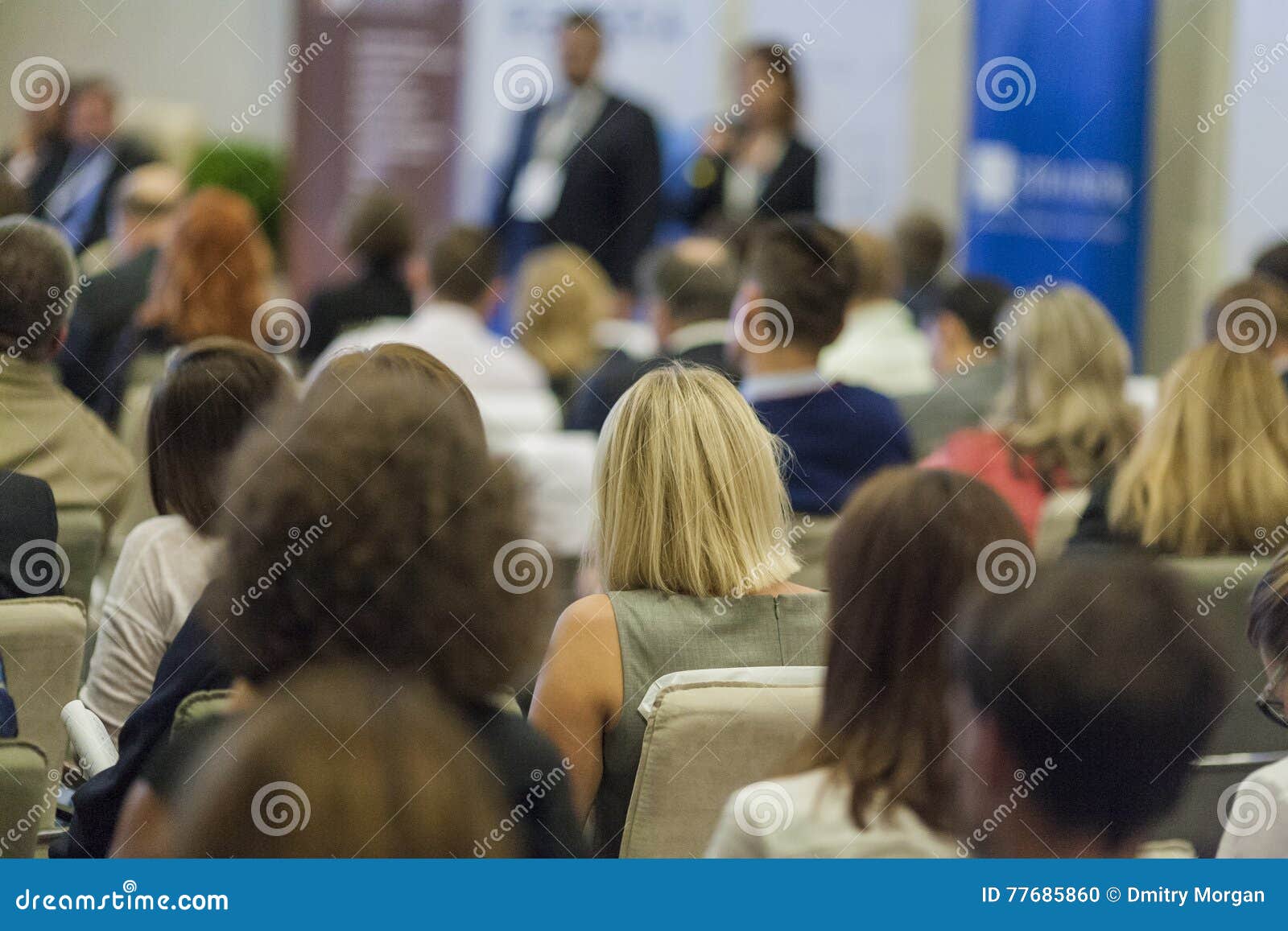 Host Speakers Standing in Front of the Audience during the Conference ...