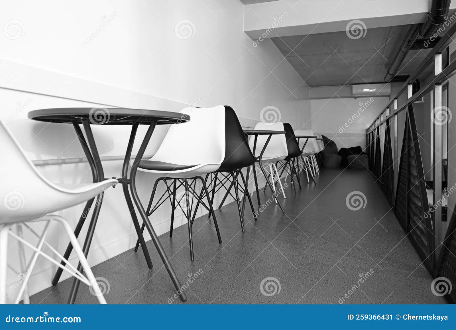 Hostel Dining Room Interior with Tables and Chairs Along White Wall ...