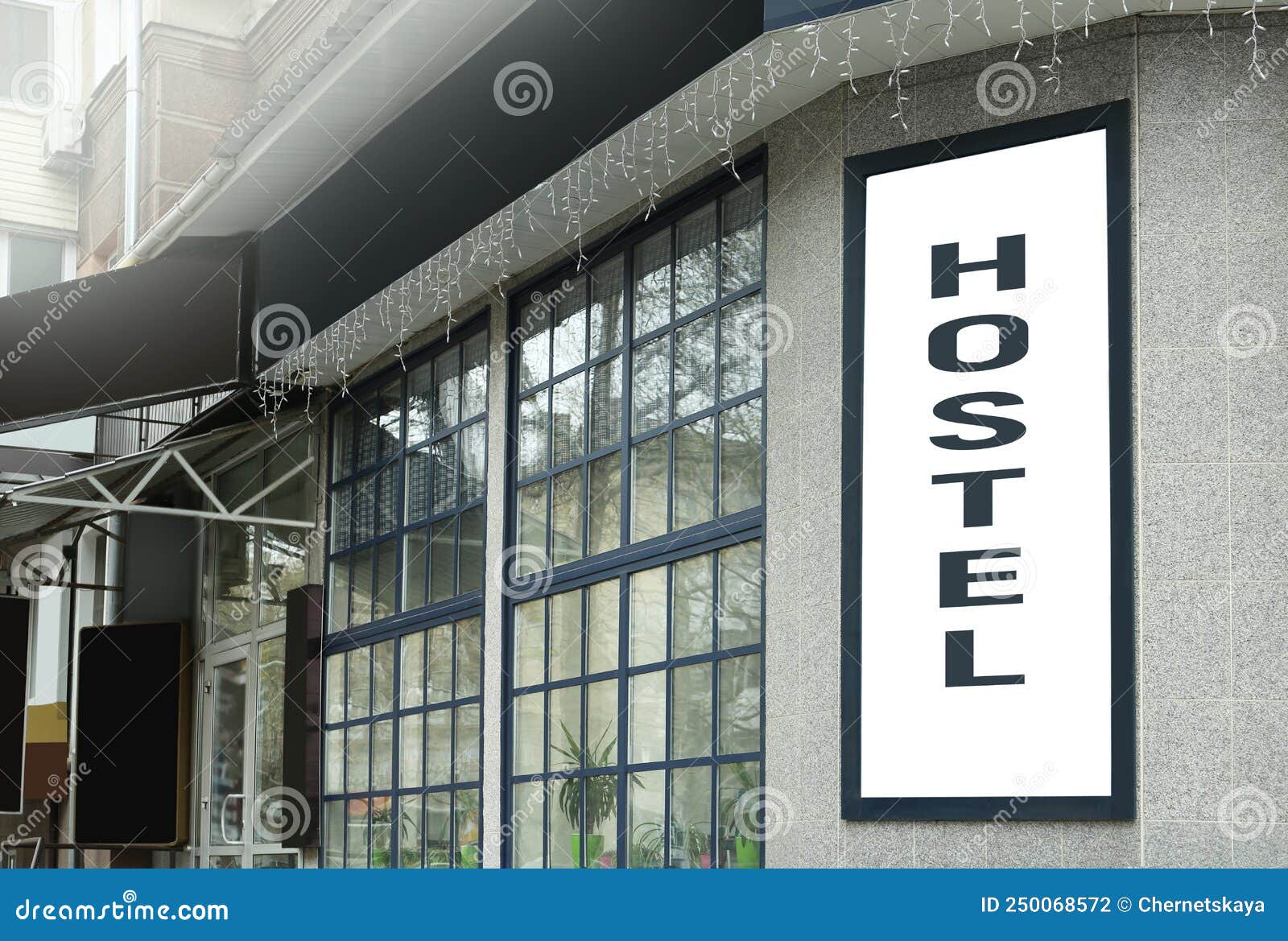 HOSTEL Sign Board on Building Facade Outdoors Stock Illustration ...