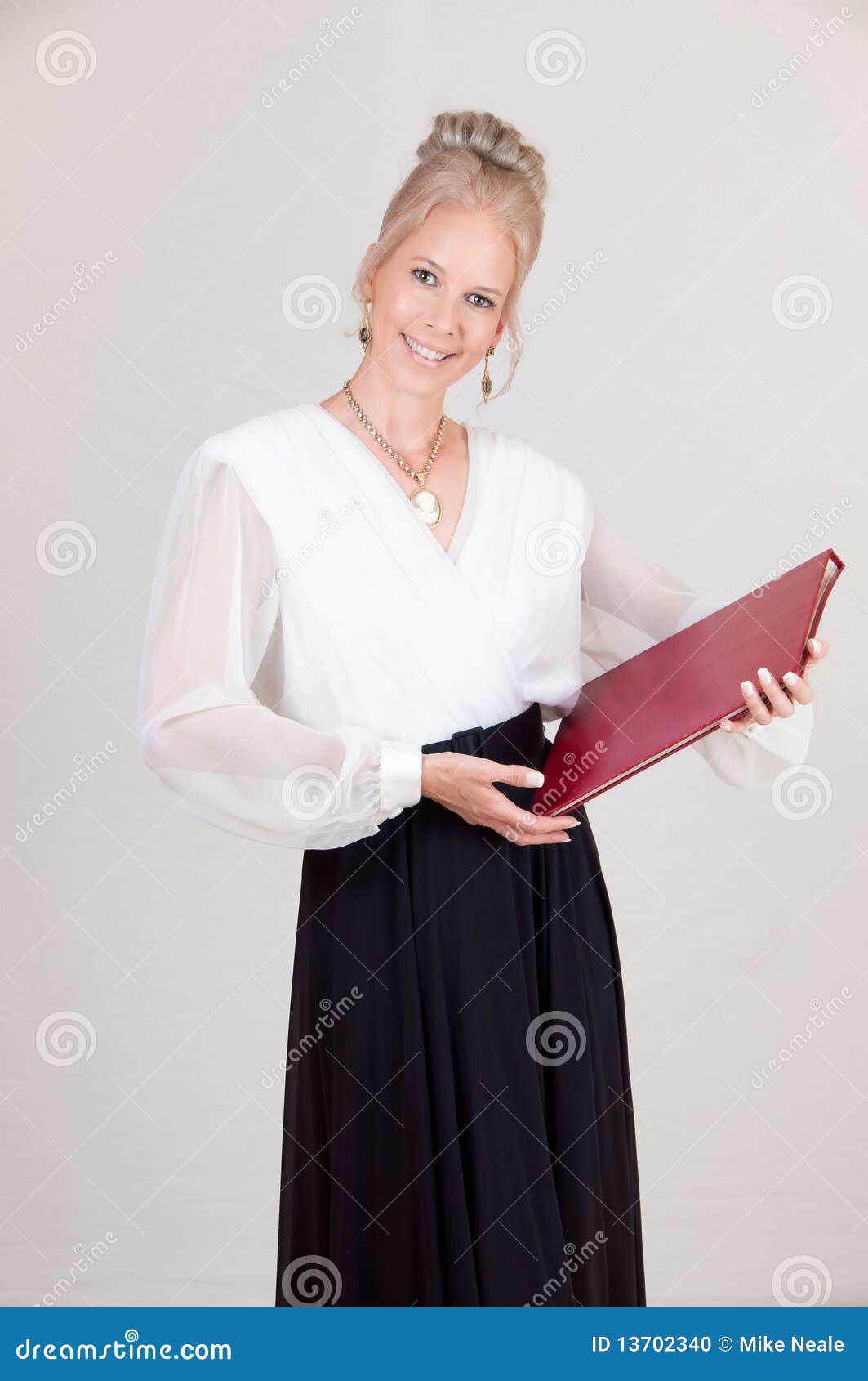 Hostess Holding Menu stock photo. Image of cheerful, staff - 13702340