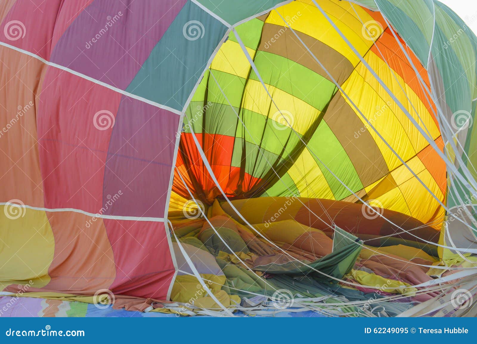 Hot Air Balloon Being Deflated on the Ground Stock Image - Image of ...