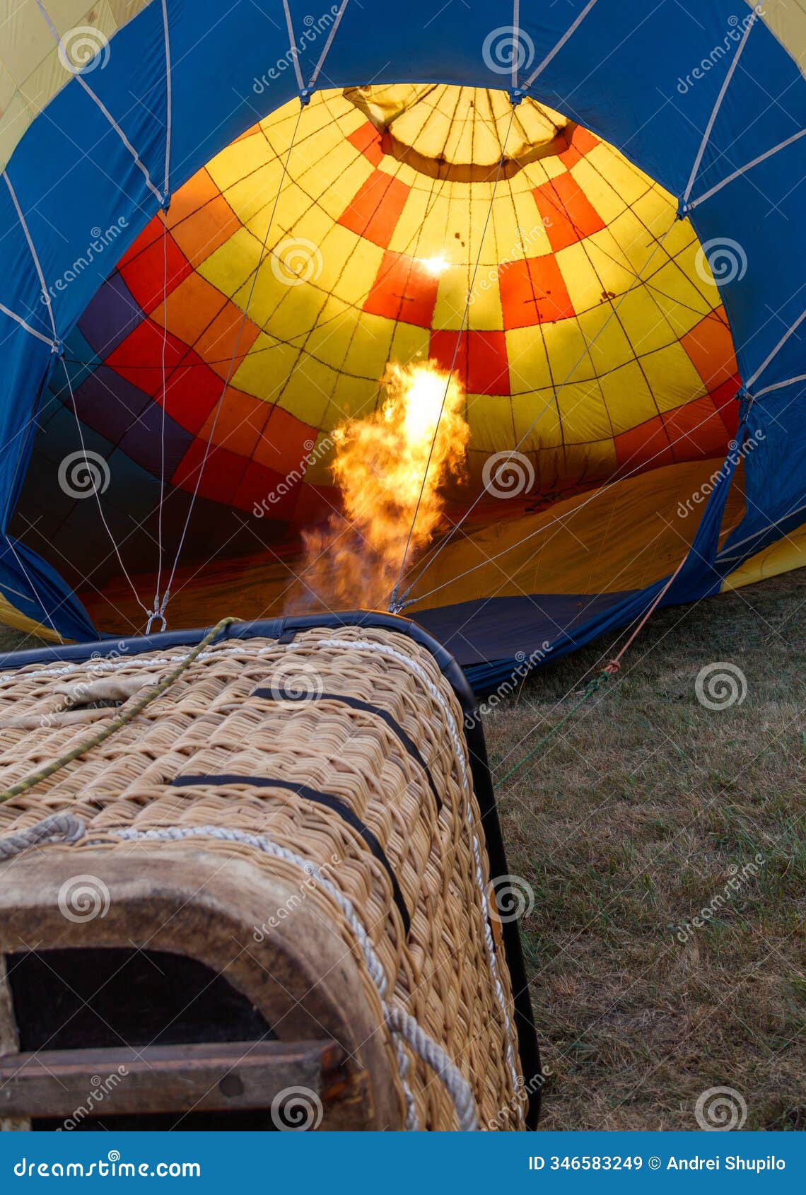 A Hot Air Balloon with a Fire in the Bottom of it Stock Image - Image ...