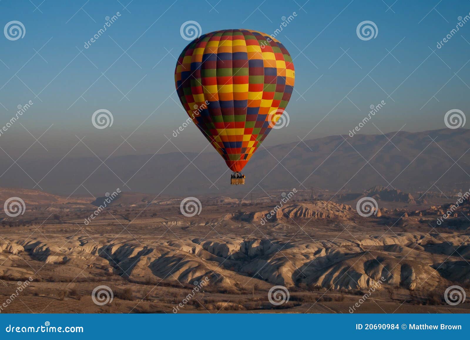 Hot air balloon in flight stock photo. Image of terrain - 20690984
