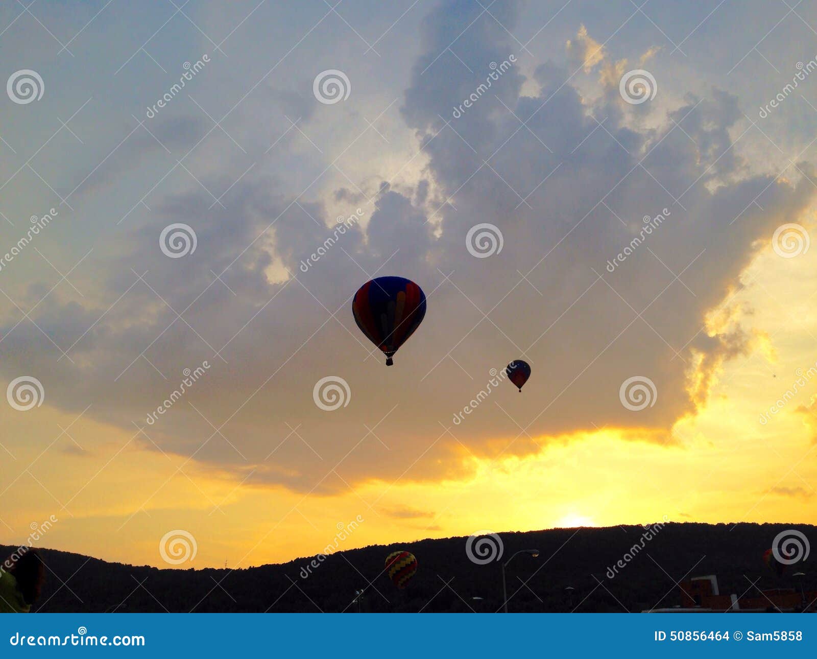 Hot air balloon at sunset stock photo. Image of sunset - 50856464