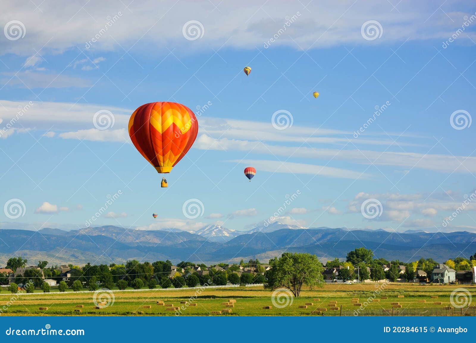 Hot Air Balloons Flying Over Tranquil Landscape Stock Image - Image of ...